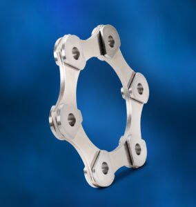 New flex element/blade triangular bushing design